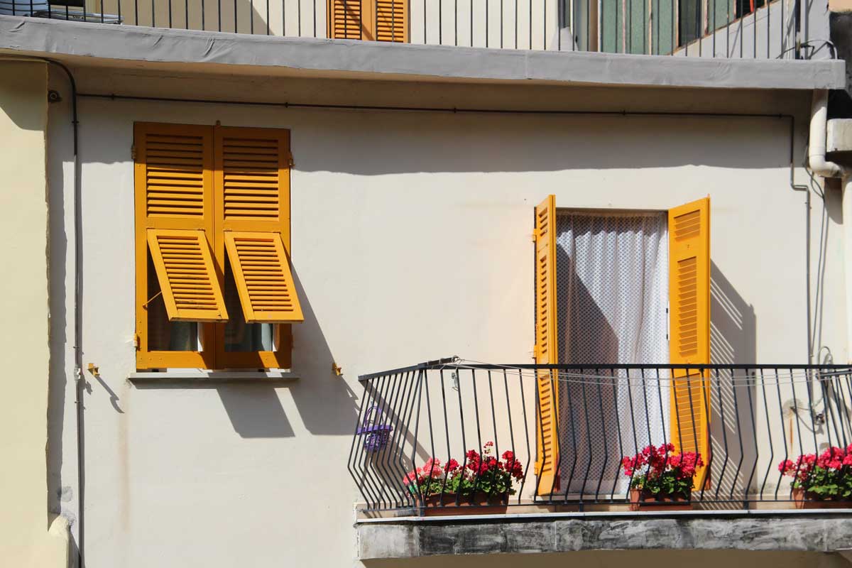 Exploring the Function and Beauty of Exterior Italian Shutters - Shutterland Exterior Shutters